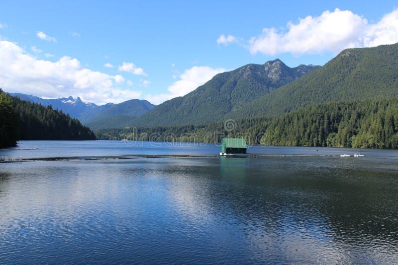 Capilano Lake, Cleveland Dam Stock Image - Image of manmade, cloudy ...