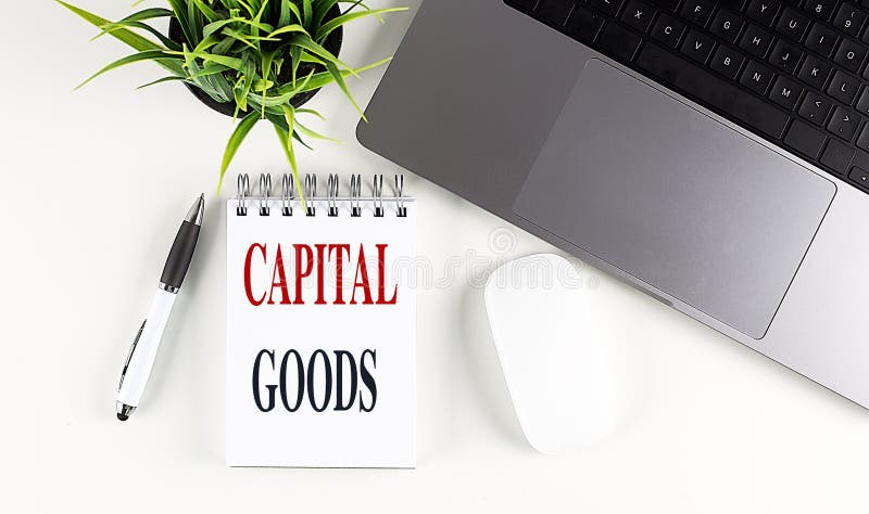 CAPITAL GOODS Text on Notebook with Laptop, Mouse and Pen Stock Image ...