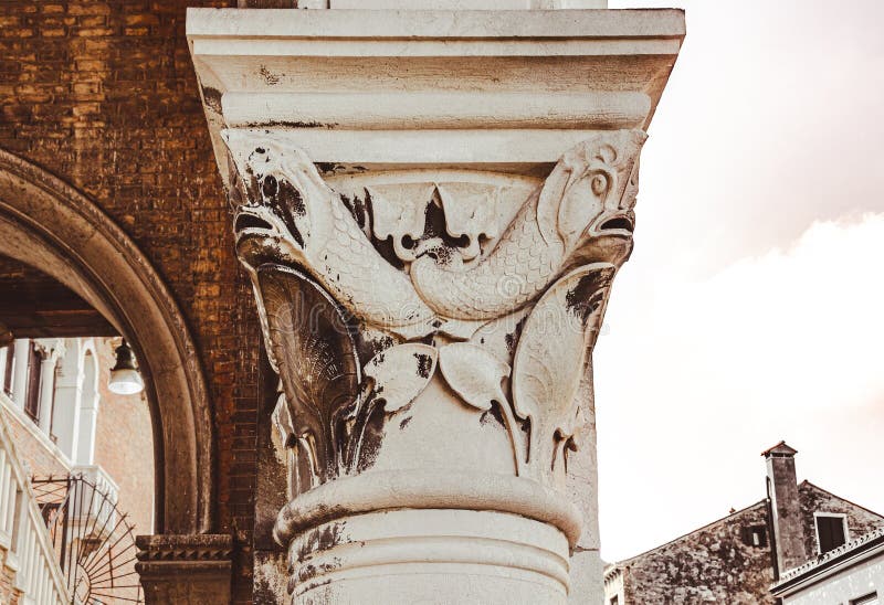 The Capital of an Old Column with Figures of Fish Looking in Different ...
