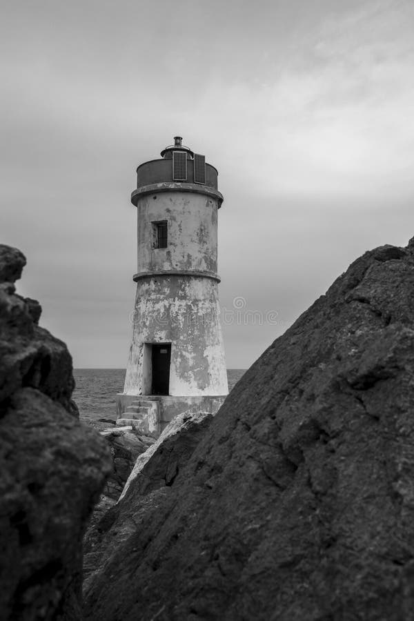 Capo Ferro Lighthouse in Sardinia Stock Image - Image of coast, sundown ...