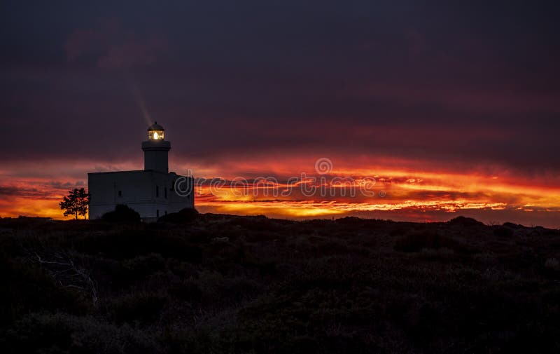 Capo Ferro Lighthouse in Sardinia Stock Image - Image of view, evening ...