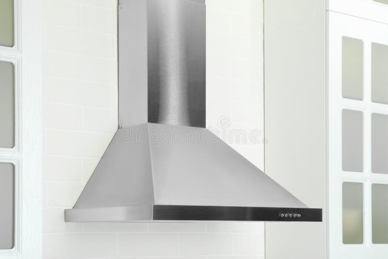 Capot De Gamme Moderne Sur Mur De Brique Blanche Dans La Cuisine Image ...