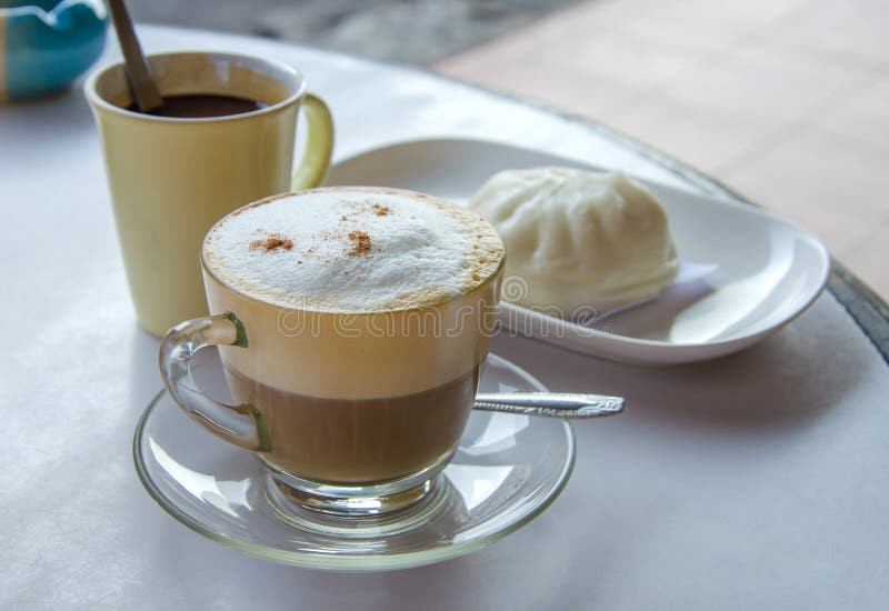 Cappuccino Coffee and Steamed Stuff Bun for Breakfast Stock Photo ...