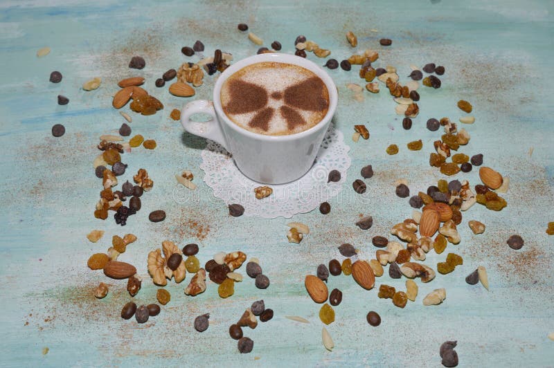 Cup of coffee with nuts stock photo. Image of cappuccino - 97861776
