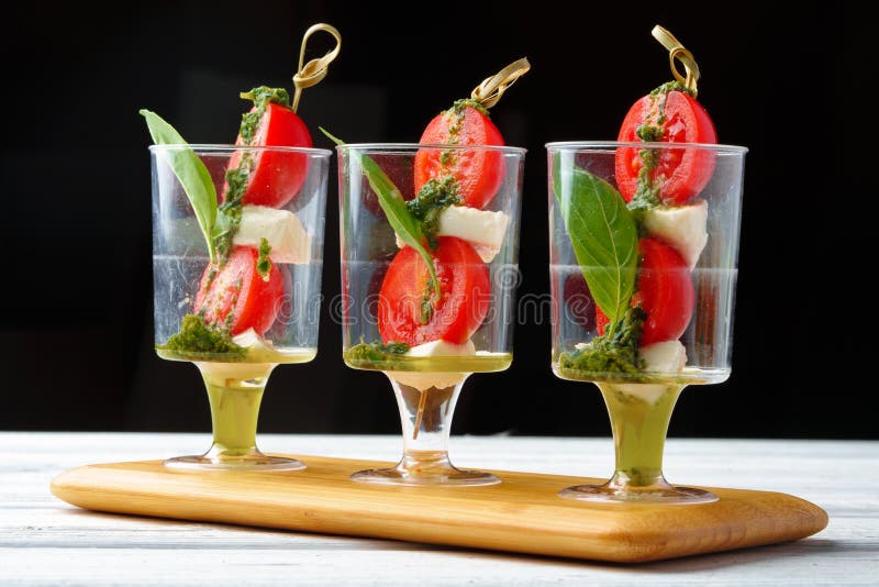Caprese Canapes in Glasses on a Skewer Stock Image - Image of table ...