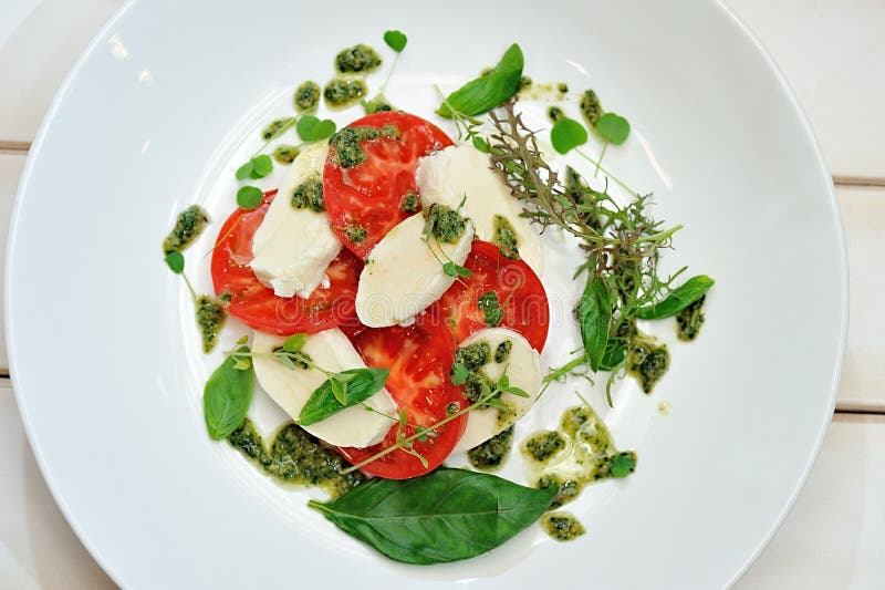 The Caprese salad stock photo. Image of cookery, basil - 73292548