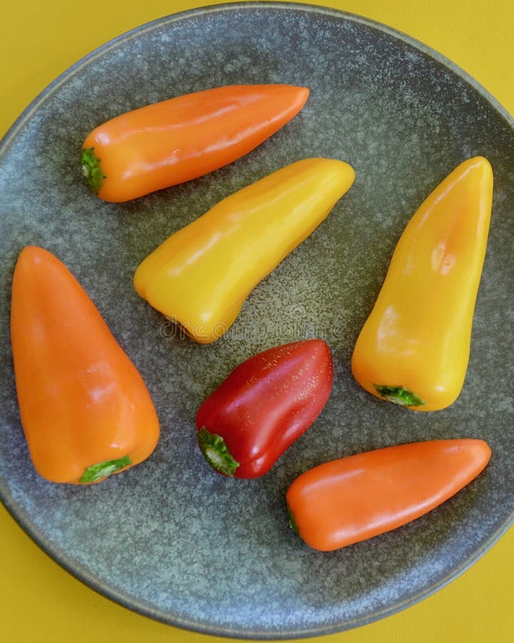 Capsicums on a Plate in the Kitchen Stock Photo - Image of spice ...
