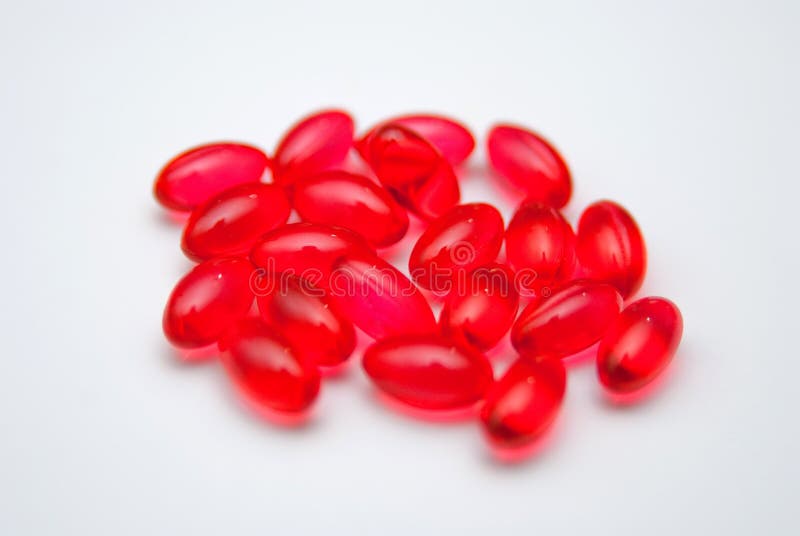 Capsule molli rosse fotografia stock. Immagine di commercio - 13717670