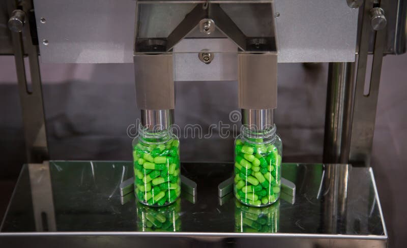 Process of Capsule Filling and Capping Machine Stock Photo - Image of ...