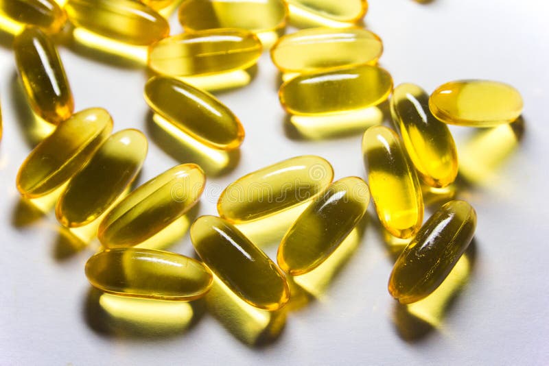 Capsule Pills stock photo. Image of excess, yellow, close - 35516804