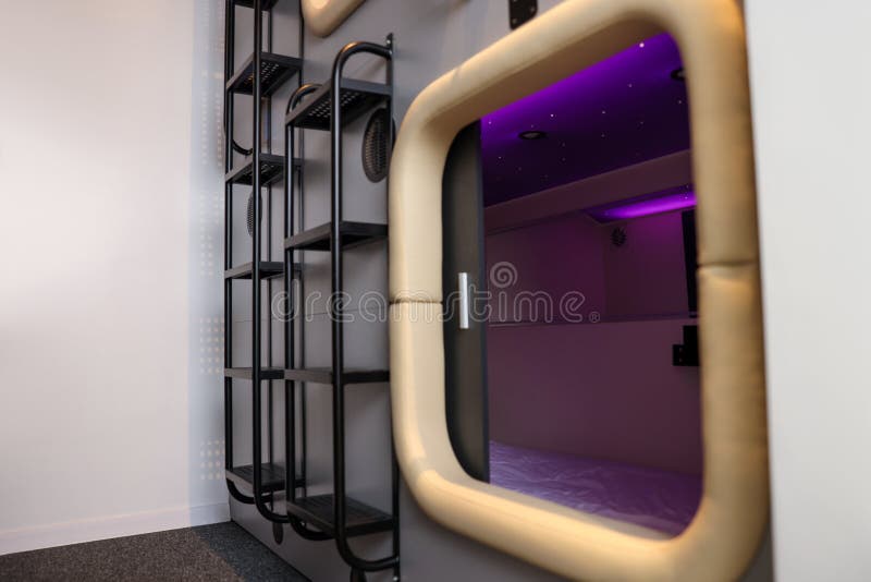 Capsule with Purple Light in Pod Hostel Stock Photo - Image of ...
