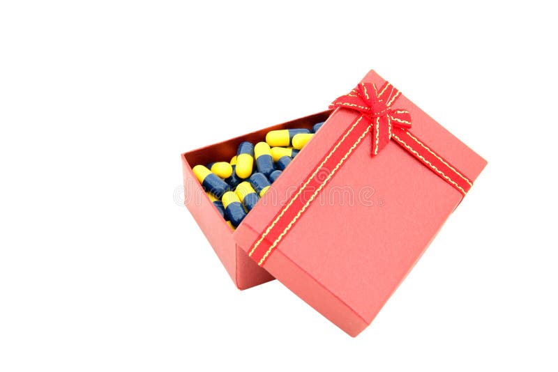 Capsule in red gift box stock image. Image of macro, medication - 17281851