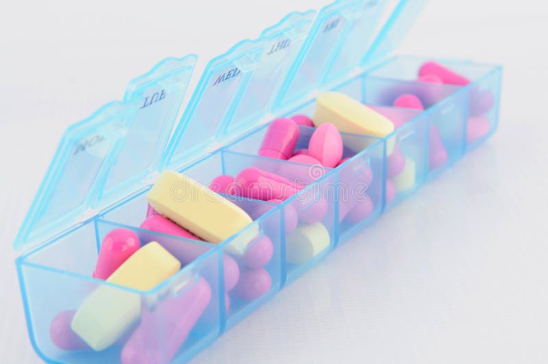 Capsule and Tablet in daily Pill Box Stock Image - Image of ...