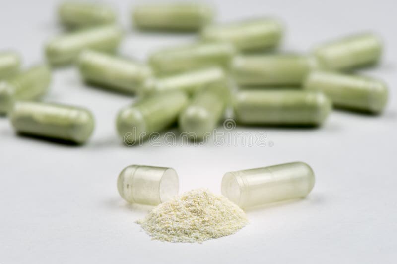 Capsule with white powder stock image. Image of doctor - 65051785