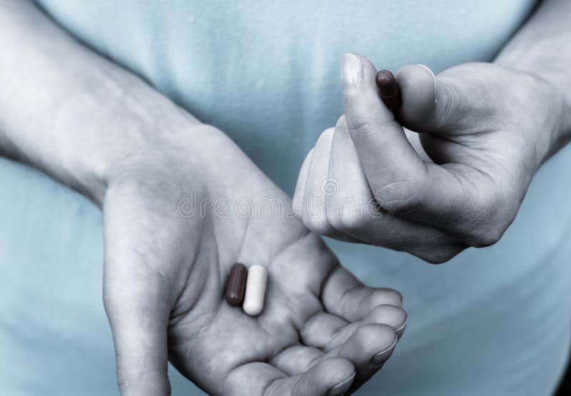 Capsules stock photo. Image of finger, capsules, close - 59983698