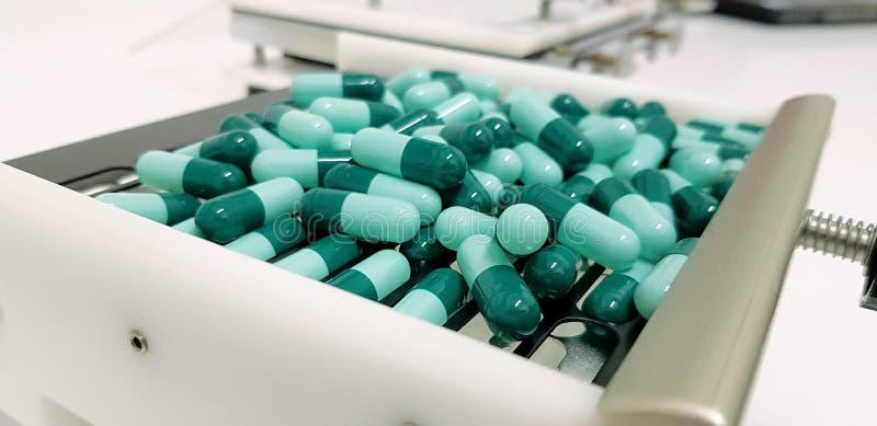 Capsules compounding stock photo. Image of capsules - 127230010
