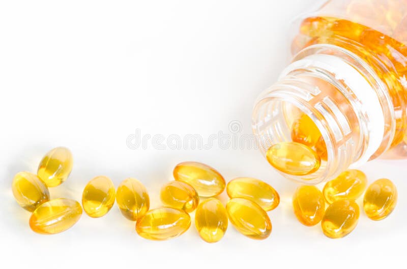 Capsules of Fish Oil Spilled Out Open Container. Stock Image - Image of ...