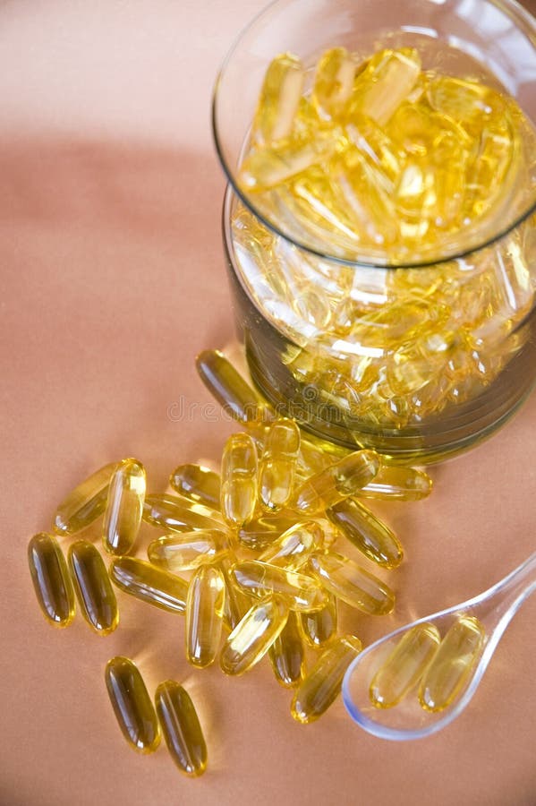 Capsules in glass bottle stock image. Image of pills - 39935397