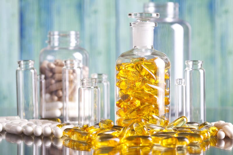 Capsules in Glass Medical Containers Stock Photo - Image of bottle ...
