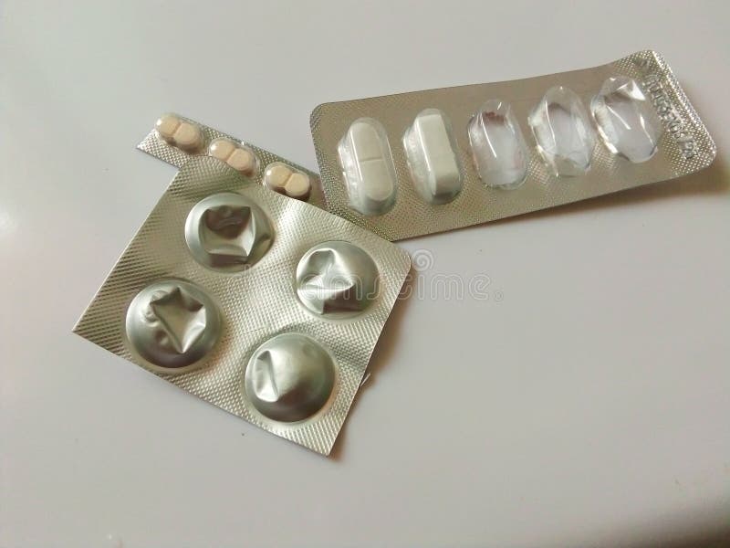 Capsules and Tablet with Wrapper Stock Photo - Image of number, font ...