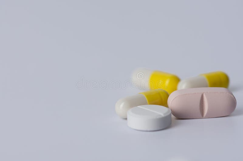 Capsules and Tablets Oval and Round on a White Background Stock Image ...