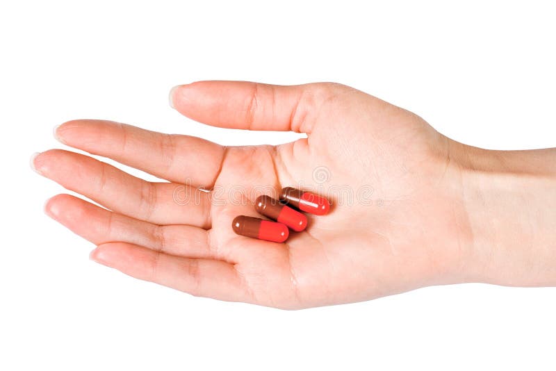 Capsules in woman s hand stock image. Image of health - 20617553