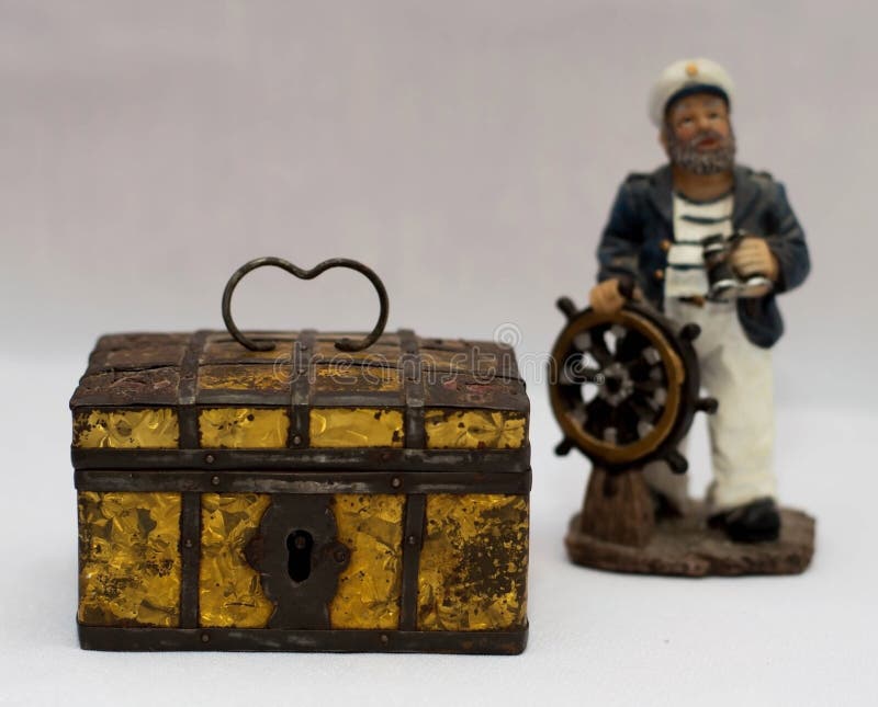 Captain in cap at the helm stock image. Image of treasure - 124101425