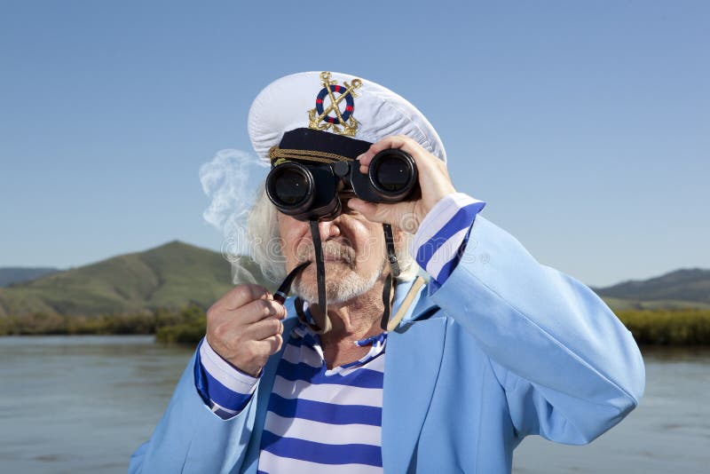Captain Looks Through A Telescope Stock Image - Image of marine ...