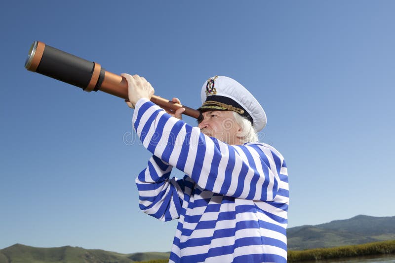 Captain Looks through a Telescope Stock Photo - Image of ship ...