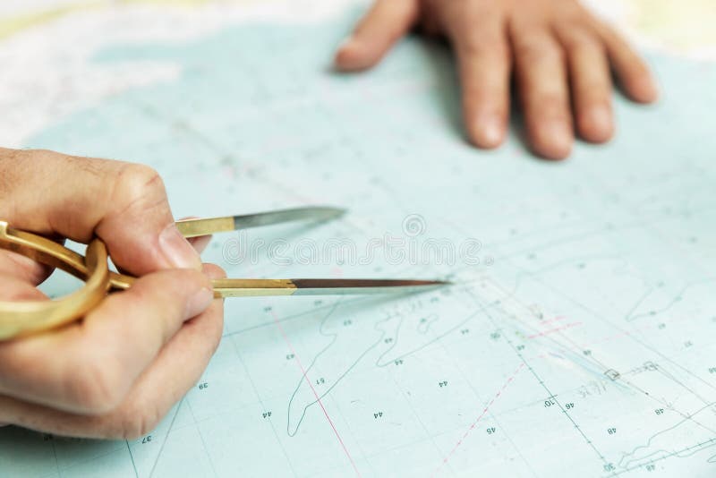 The Captain Measures the Distance on the Map with a Compass. Close-up ...