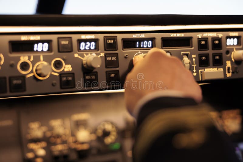 Captain Pushing Buttons To Fix Altitude Level on Control Panel Command ...