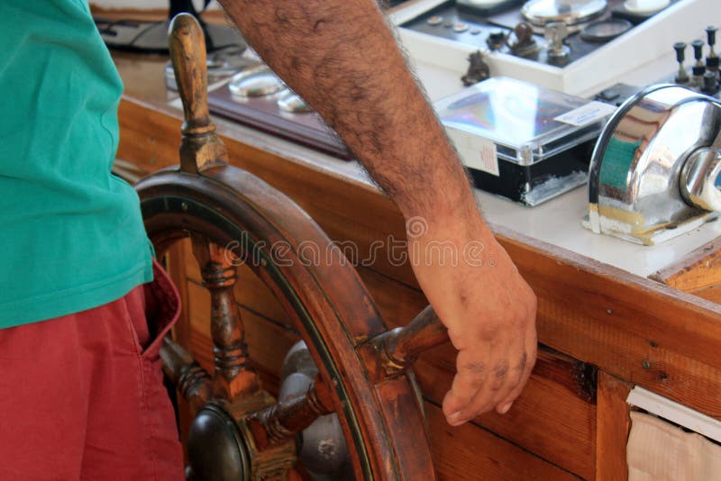 Captain S Hand Holding Steering Wheel of Sailing Vessel Stock Photo ...