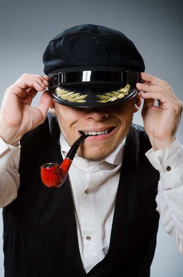Captain smoking pipe stock photo. Image of addiction - 44063270