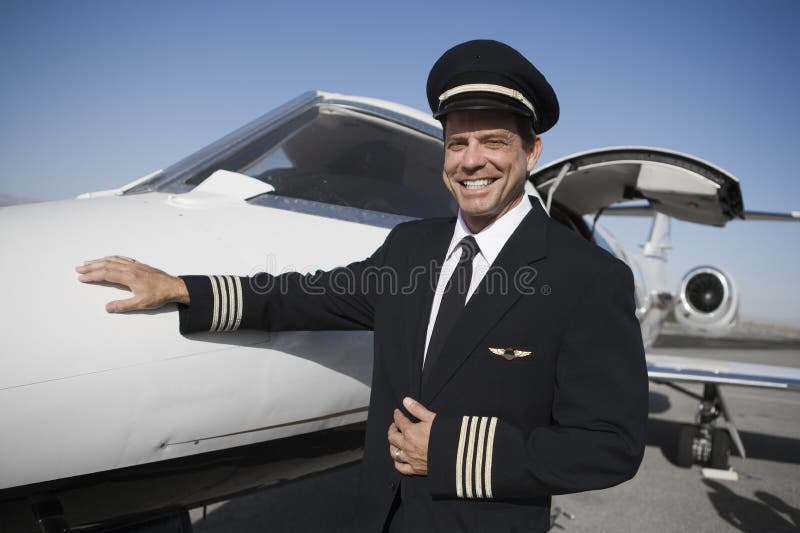 Captain Standing by Aircraft at Airfield Stock Photo - Image of ...