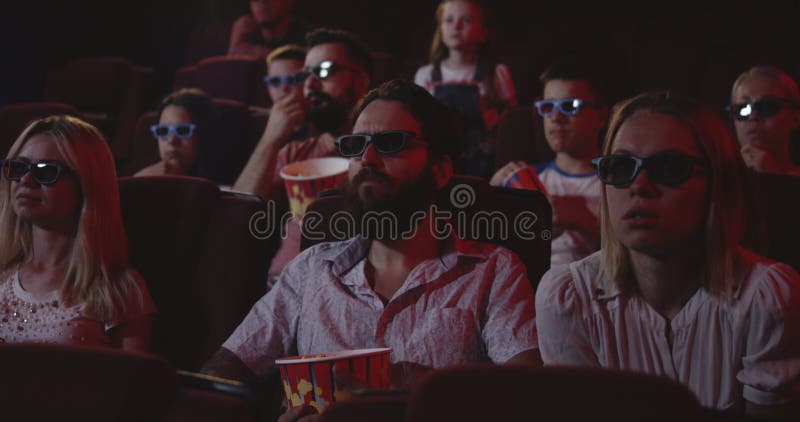 Captivated Audience Watching Movie in Cinema Stock Footage - Video of ...
