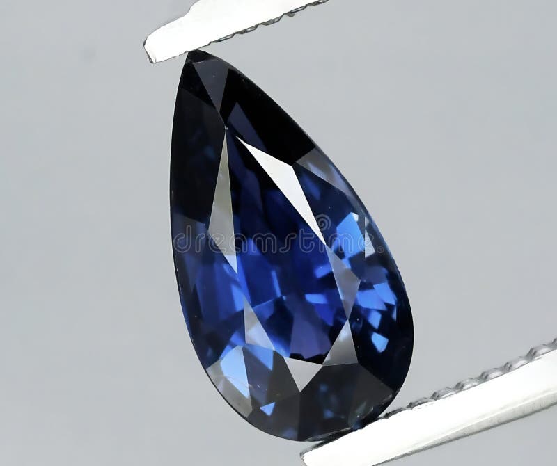 Captivating Deep Blue Teardrop Gemstone Elegantly Cropped for Display ...