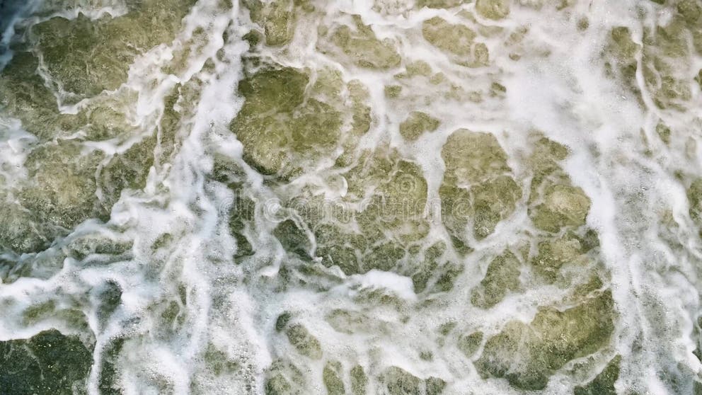 Captivating Dynamic Ocean Waves and Intricate Foam Patterns Creating a ...