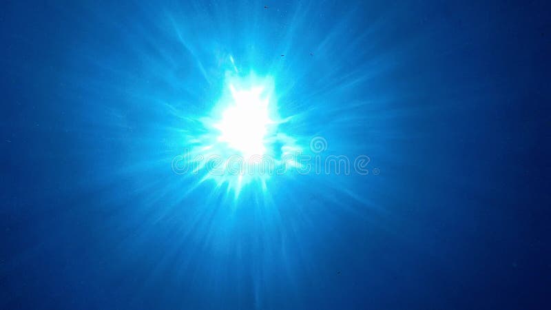 Captivating Footage of Light Dancing Across the Underwater Surface ...