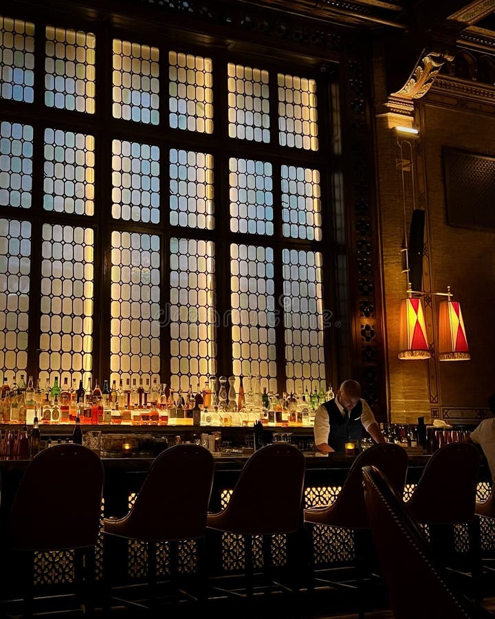 Golden Hour Elegance: a Quiet Moment at the Bar Editorial Image - Image ...