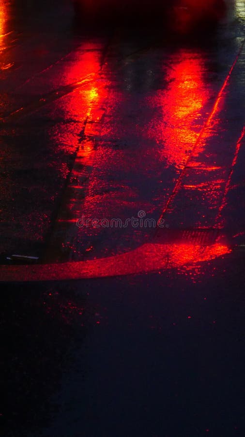 Red Light Reflection on the Sidewalk at Night, Festive and Mysterious ...