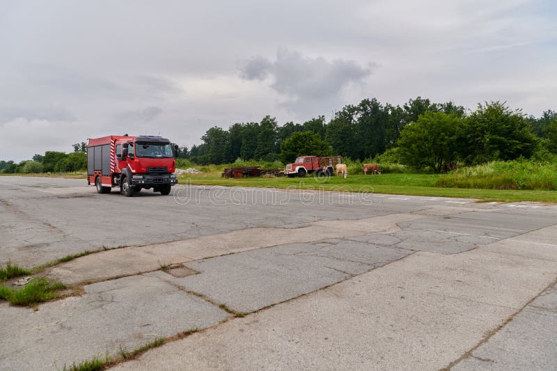 In this Captivating Scene, a State-of-the-art Firetruck, Equipped with ...