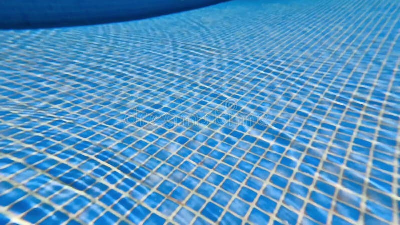 The Captivating Underwater Pool Surface Displays a Grid Pattern ...