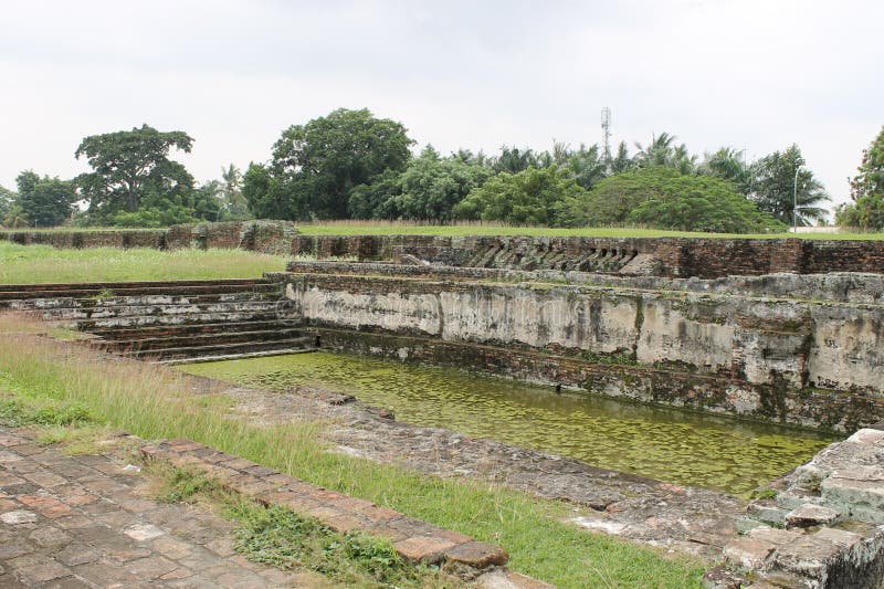 A Captivating View of an Ancient Ruin, Featuring a Weathered Stone Pool ...
