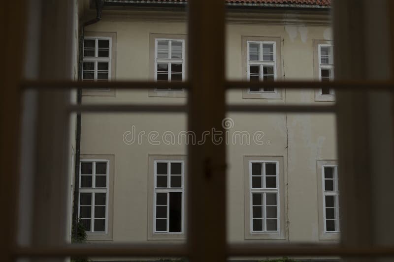 A Captivating View of a Building As Seen through a Decorative Window ...