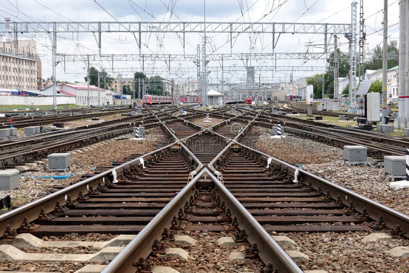 The Captivating View of Railroad Tracks Converging at a Bustling and ...