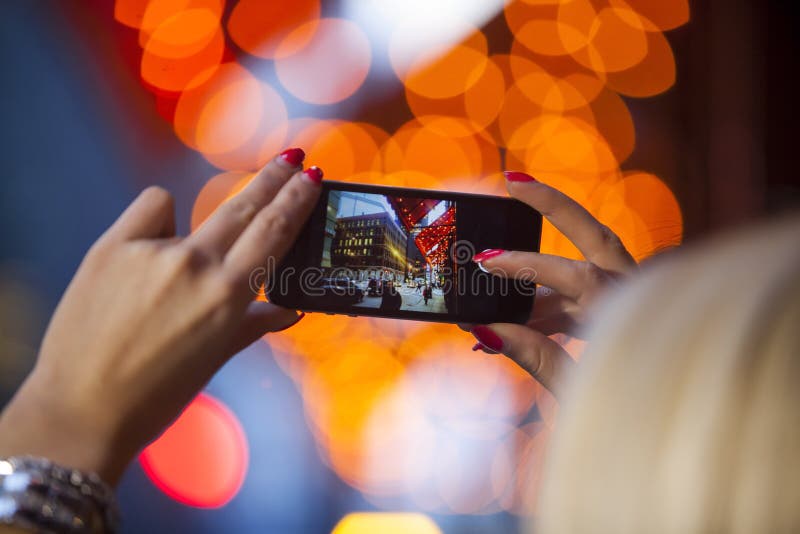 Capturing the Moment with a Smartphone Stock Photo - Image of ...