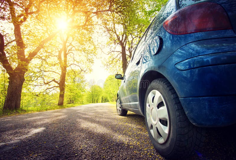 Car on Asphalt Road in Spring Stock Image - Image of park, landscape ...