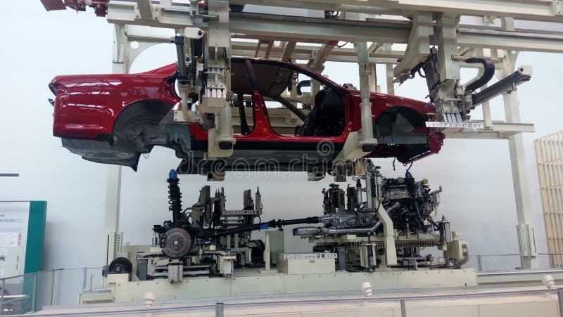 Car Assembly Process in Factory Stock Photo - Image of machine, process ...