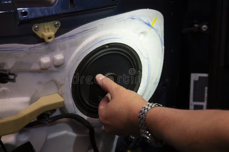 Car Audio System.Installation of Acoustics in the Front Doors of the ...