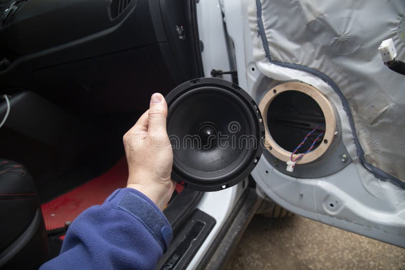 Car Audio System.Installation of Acoustics in the Front Doors of the ...